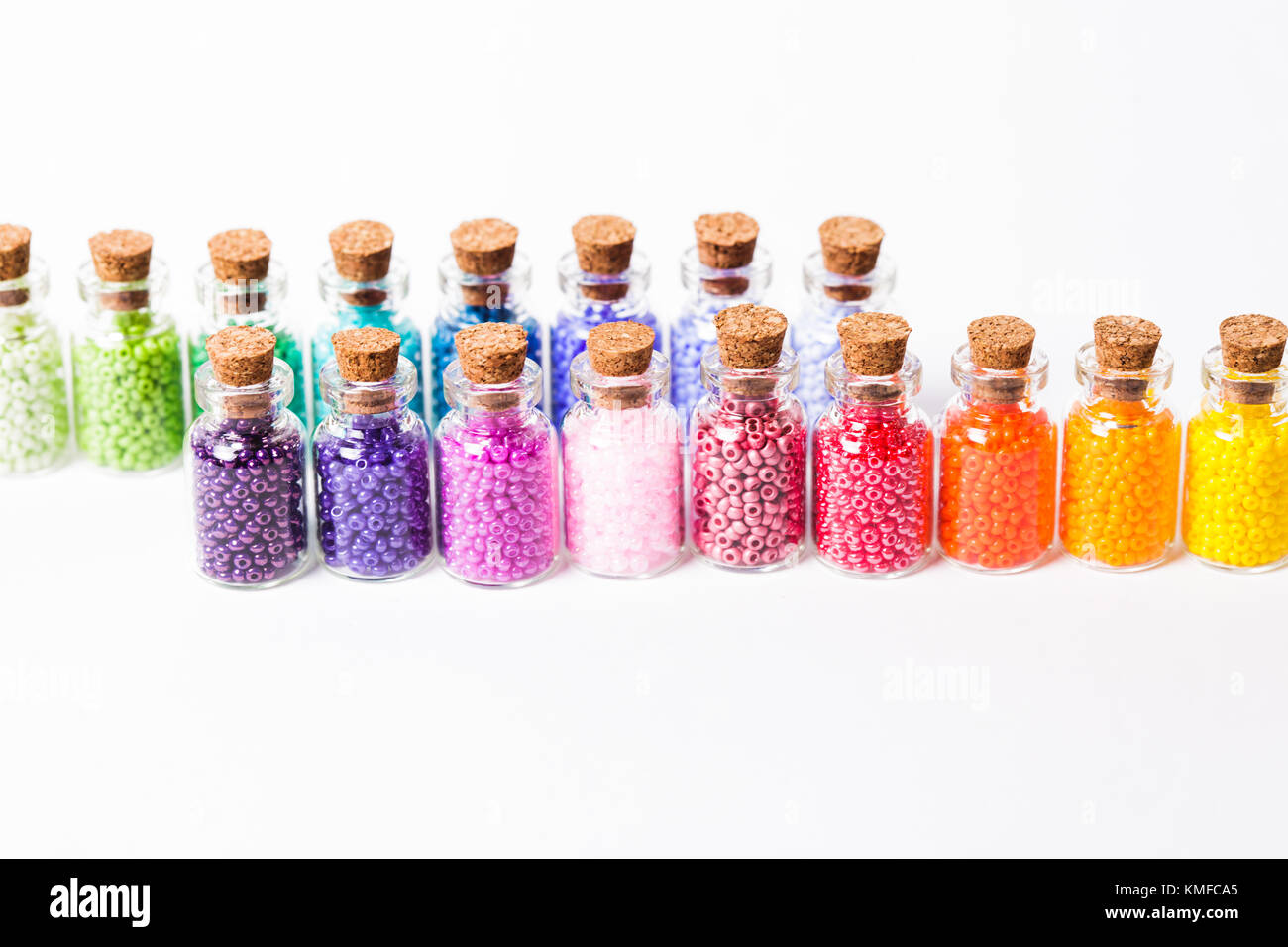 Colorful beads in the bottles Stock Photo - Alamy