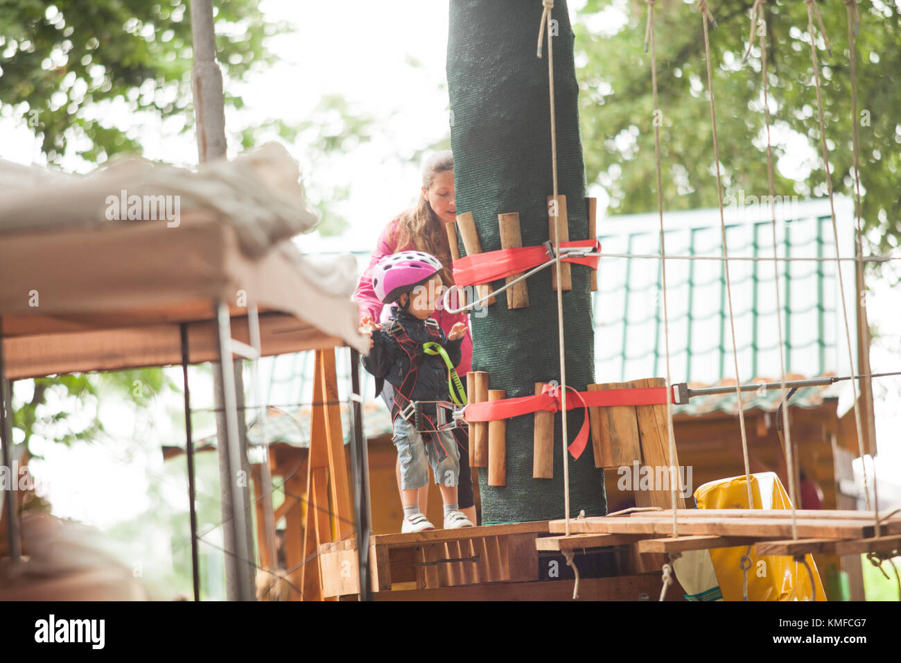 The obstacle course in adventure park Stock Photo - Alamy