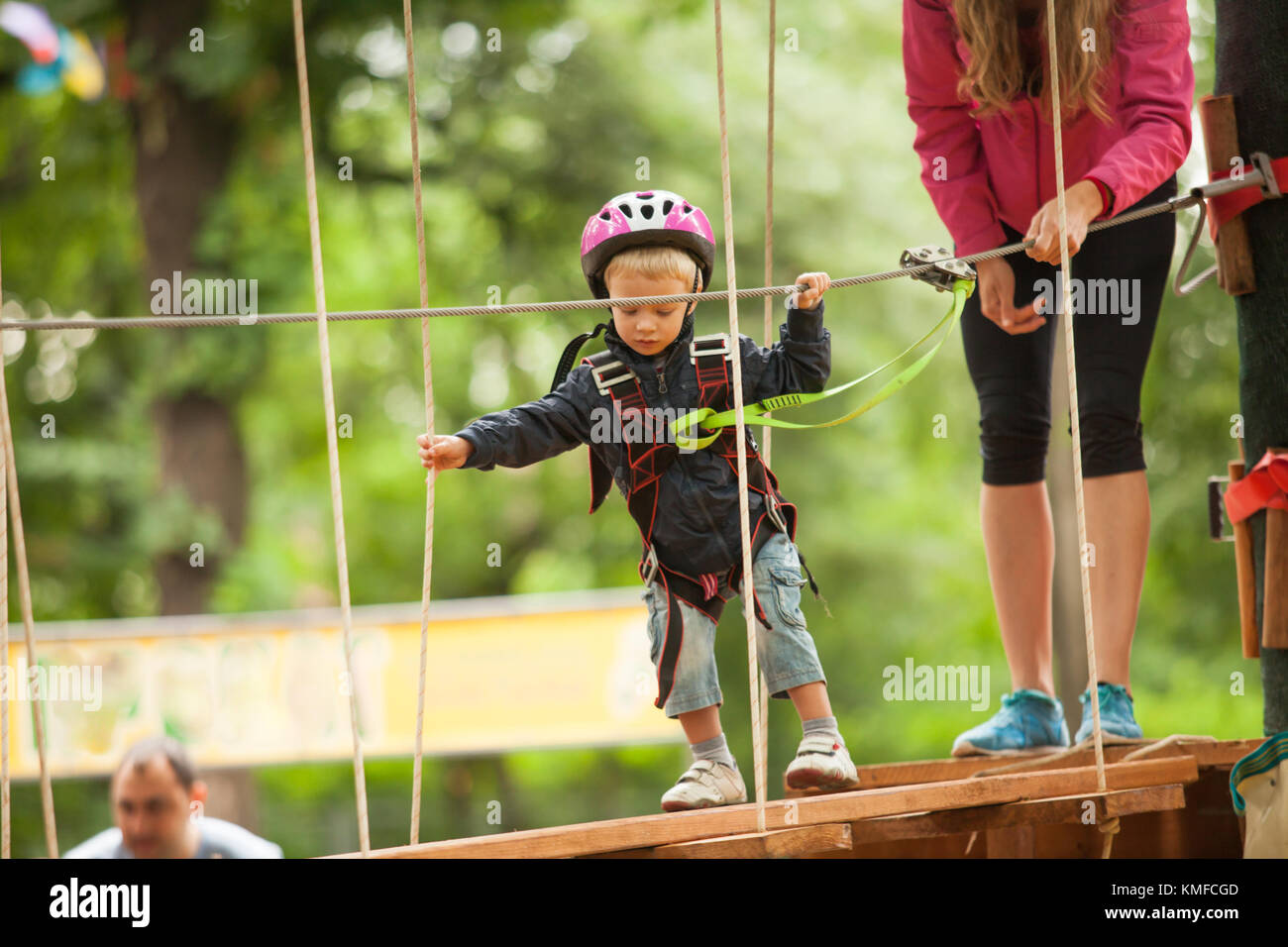 The obstacle course in adventure park Stock Photo - Alamy