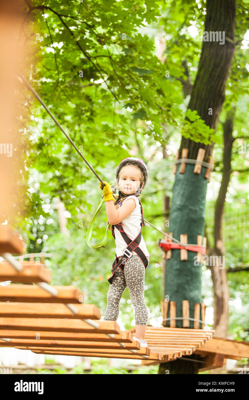 The obstacle course in adventure park Stock Photo - Alamy