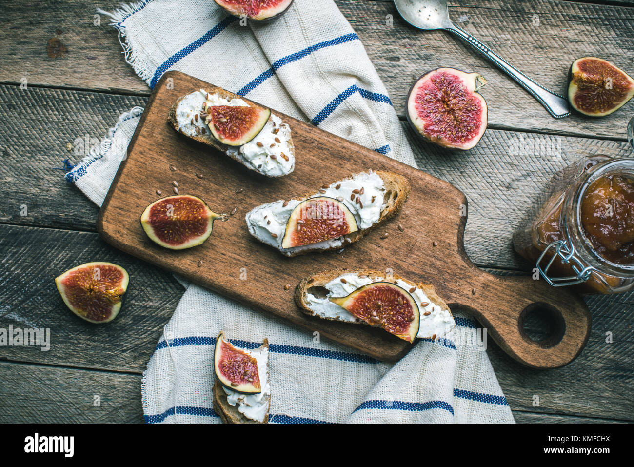 rustic style healthy snacks with cut figs on napkin. Breakfast, lunch ...