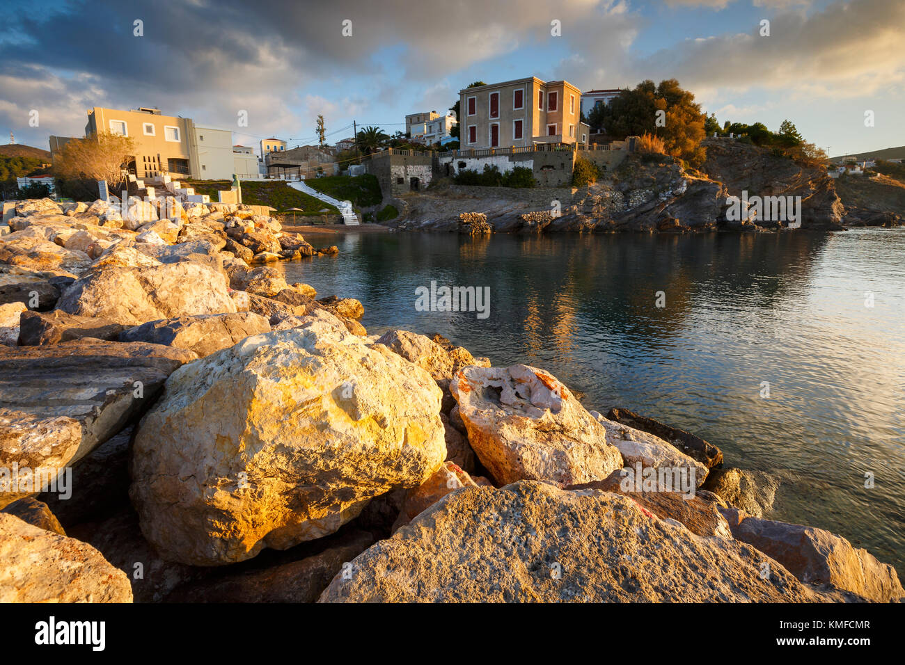 Small beach in the village of Inouses island in Greece Stock Photo - Alamy