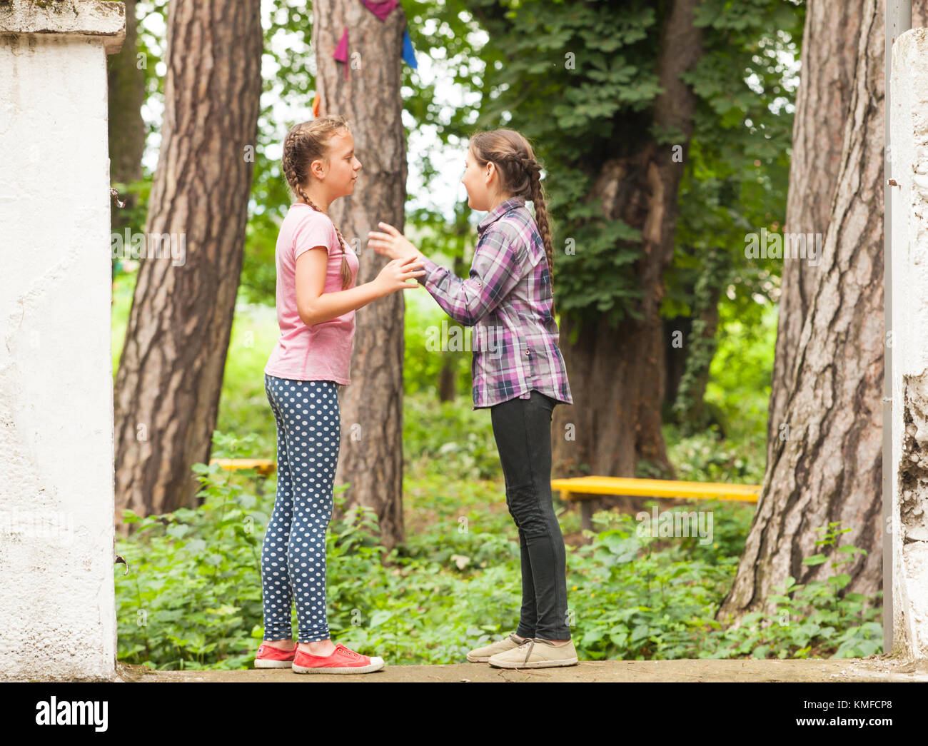 Two girls are playing Stock Photo - Alamy
