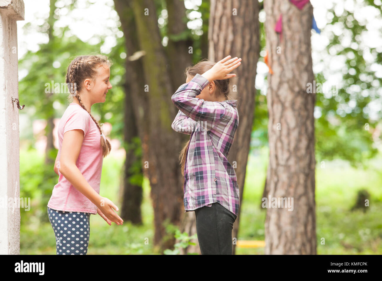 Two girls are playing Stock Photo - Alamy