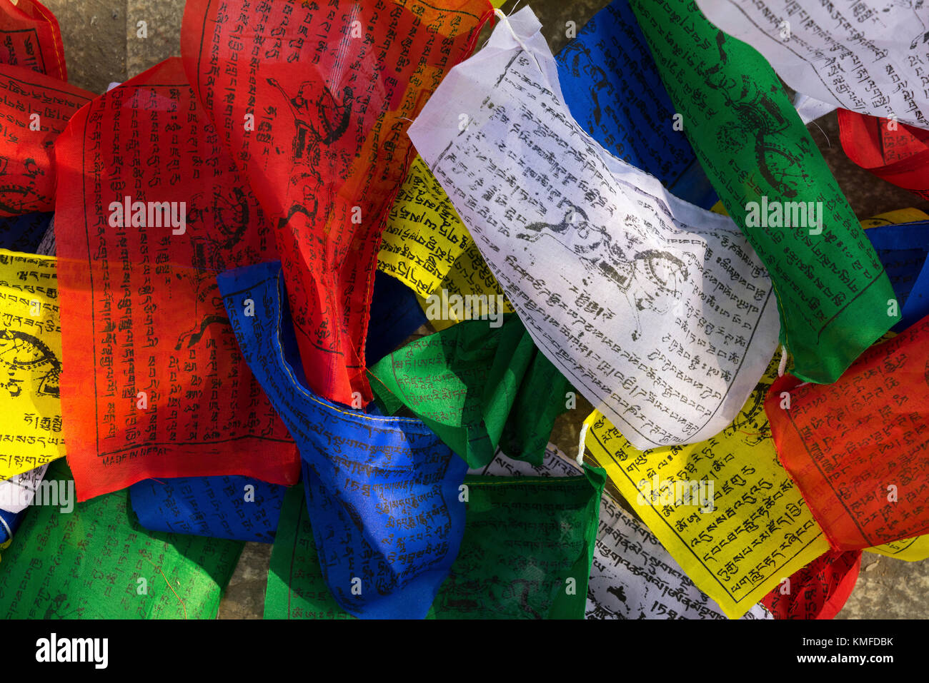 Buddhist colorful prayer flags with printed mantras. Religion symbols ...