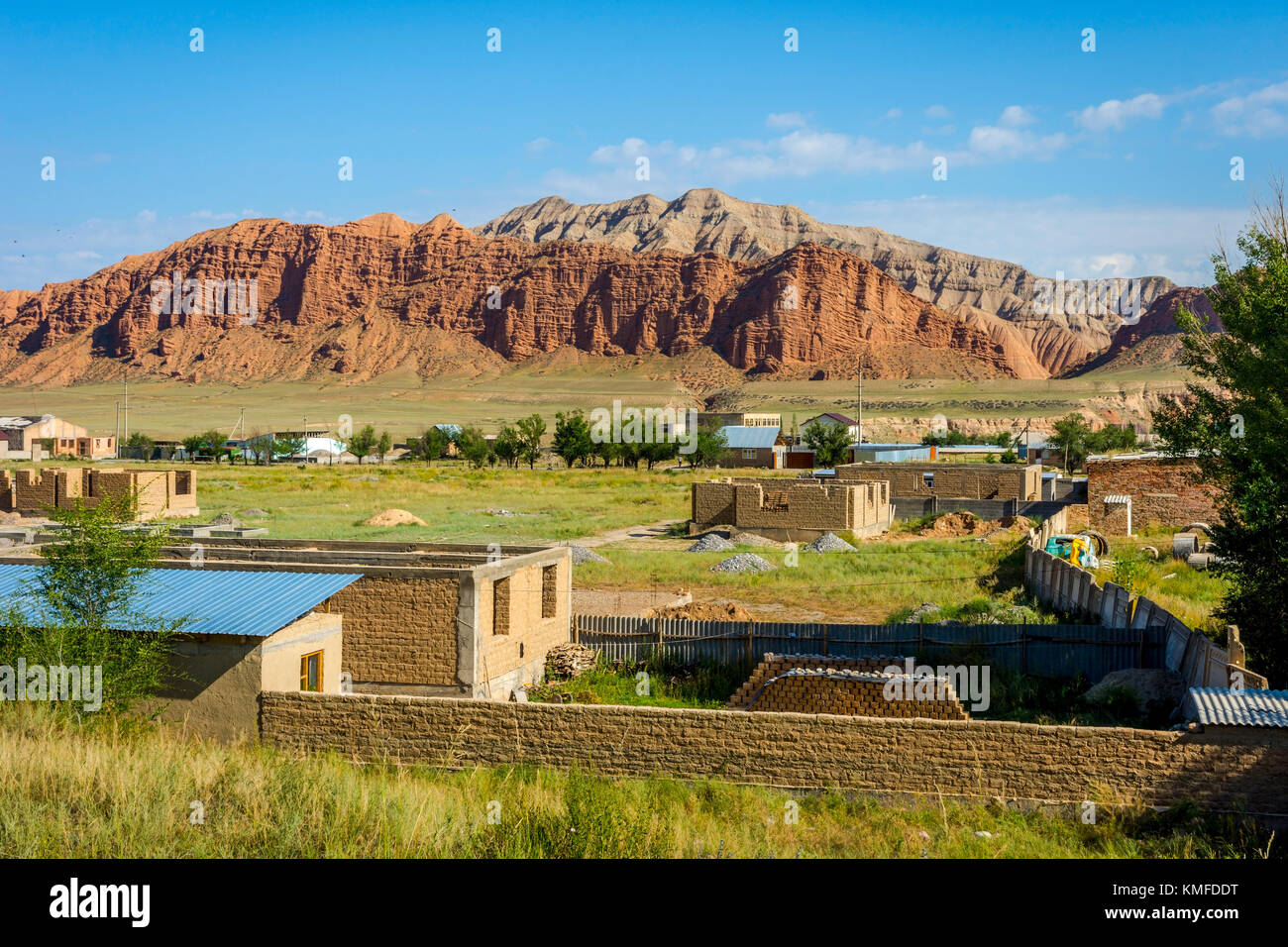 Outskirts with houses and mountains of naryn city hi-res stock ...