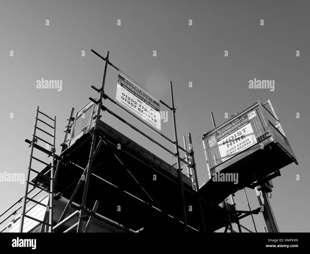 Scaffolding and hoist to residential building undergoing renovation ...