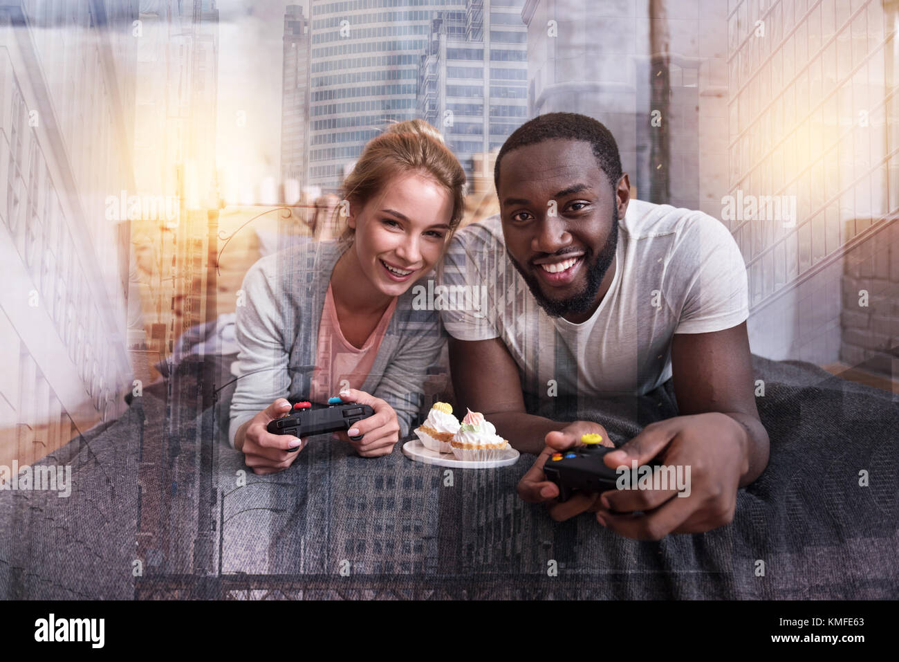 Nice cheerful couple having fun at home Stock Photo - Alamy