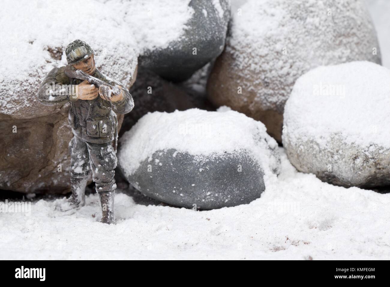 brave soldier in snowy rocks Stock Photo - Alamy