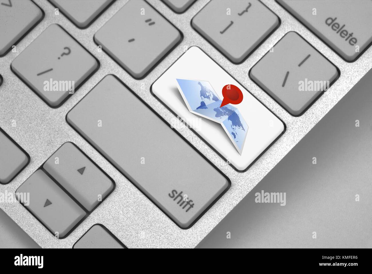 Map and pin on return key Stock Photo - Alamy