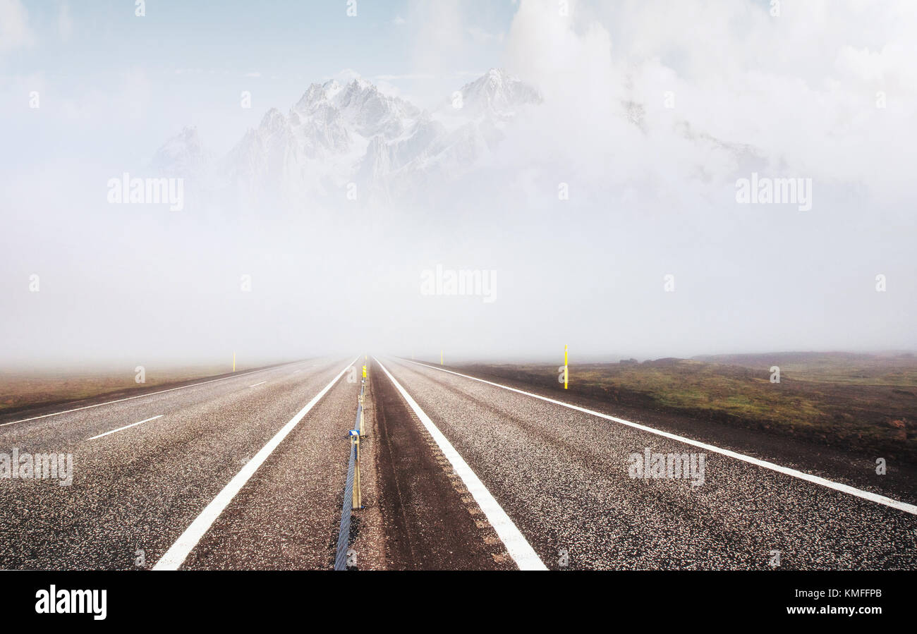 Road and snowcapped mountain, side view. Panoramic landscape Stock ...