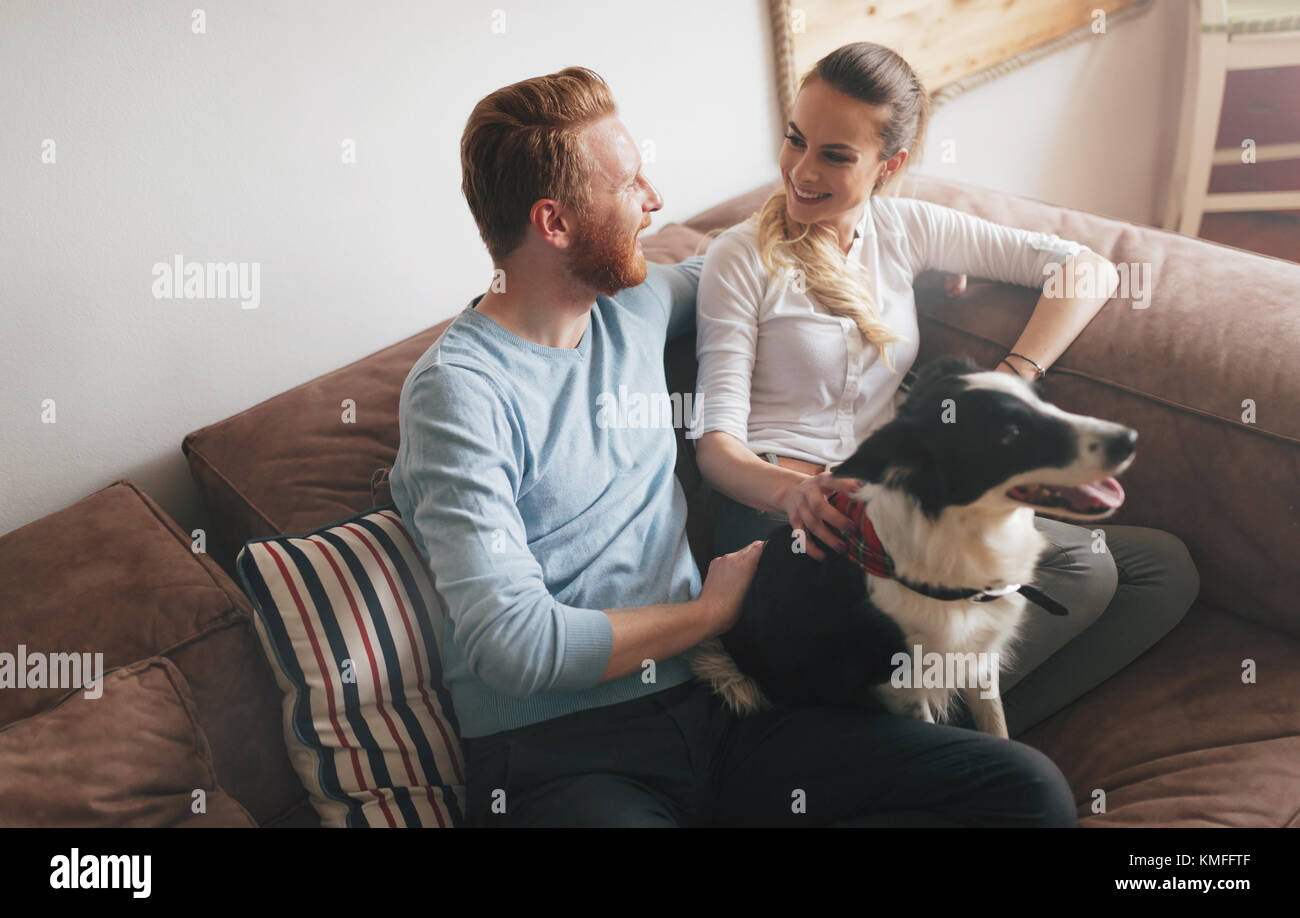 Man relaxing at home with dog hi-res stock photography and images - Alamy