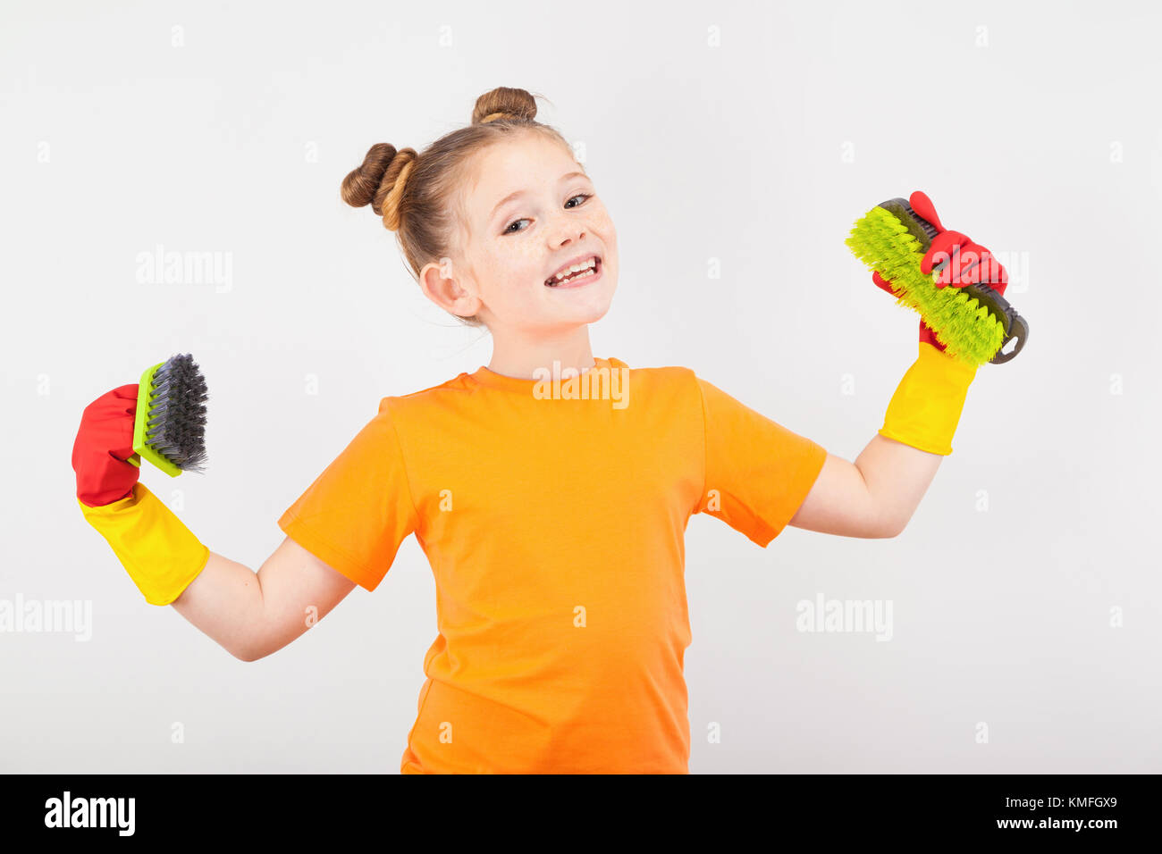 a little pretty girl doing housework Stock Photo - Alamy
