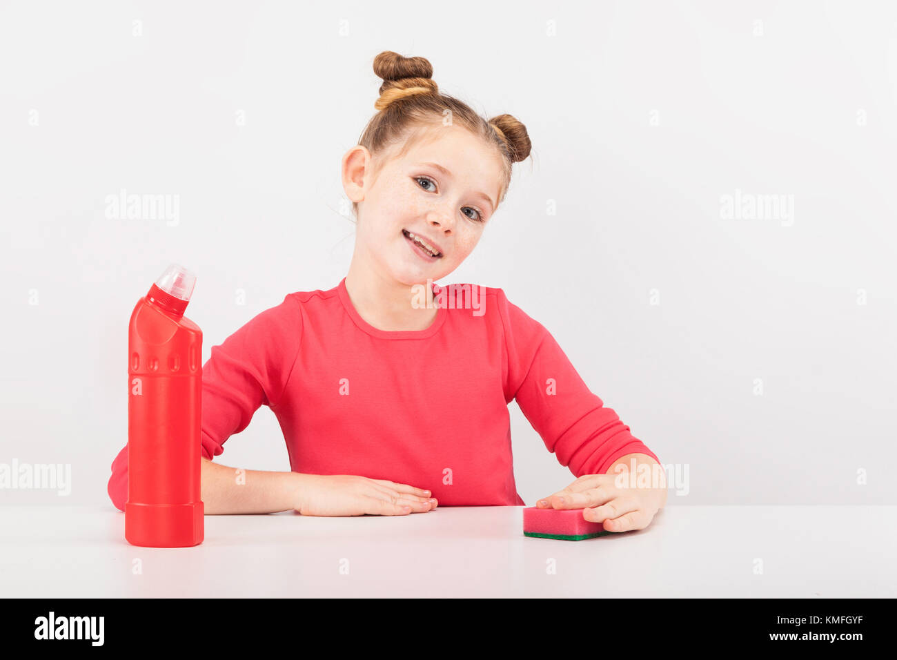 a little pretty girl doing housework Stock Photo - Alamy