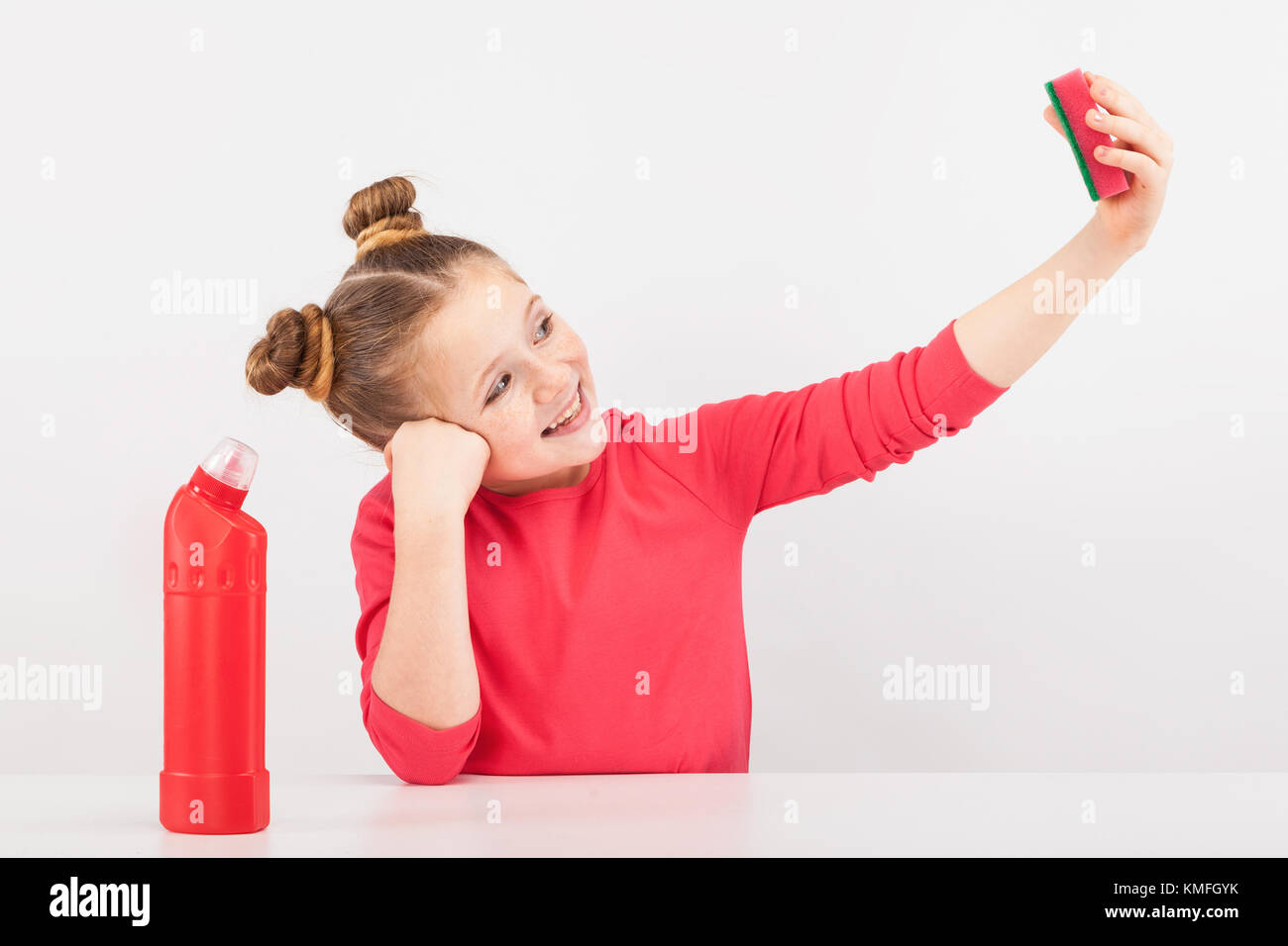 a little pretty girl doing housework Stock Photo - Alamy