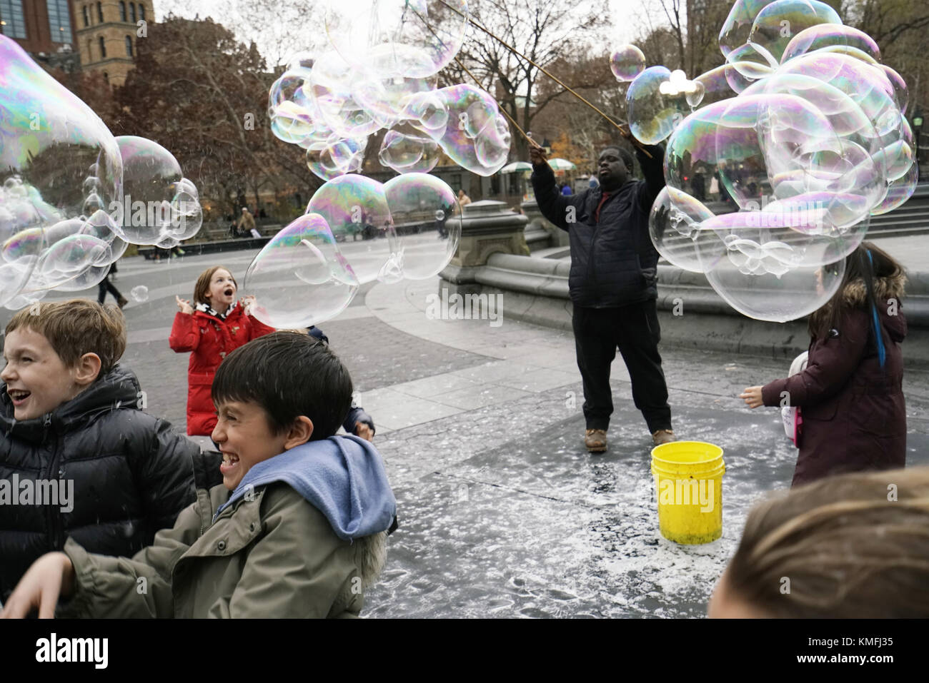 Child bubbles city hi-res stock photography and images - Alamy
