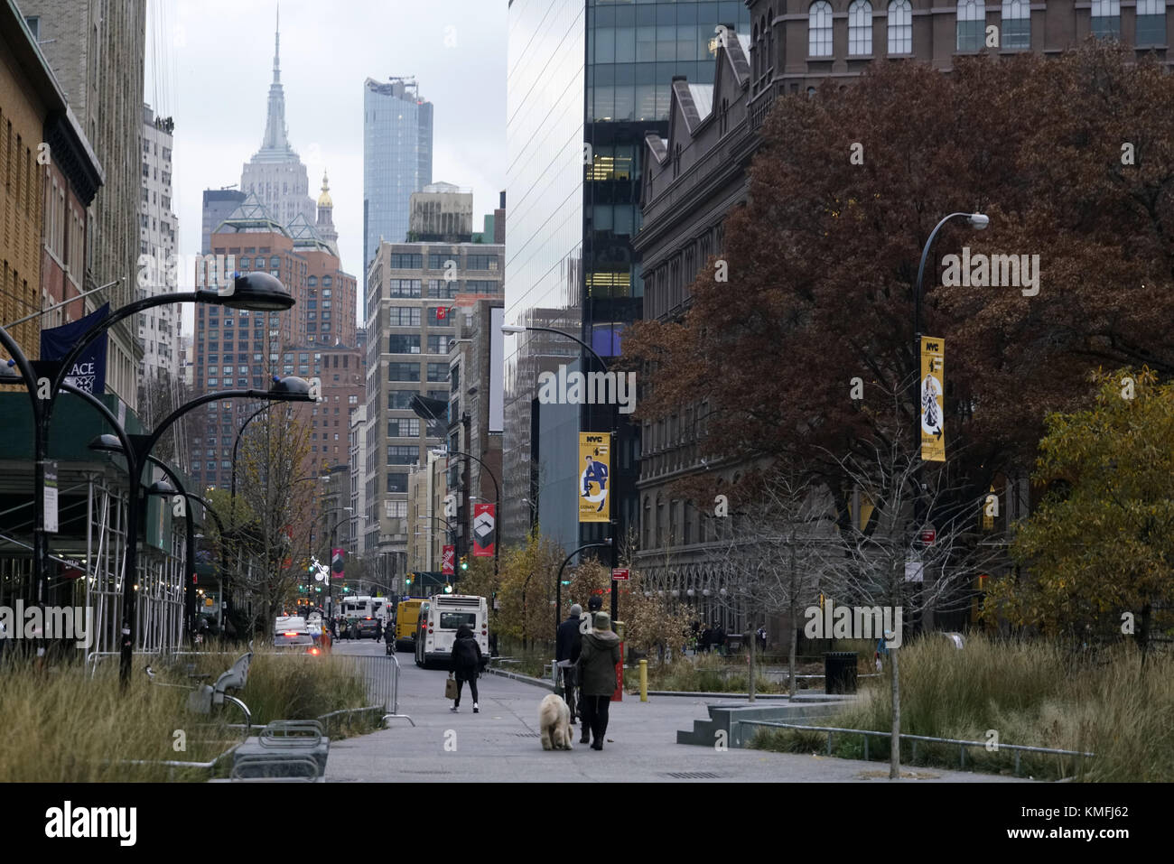 Bowery Street with Cooper Square and skyline of midtown Manhattan in ...