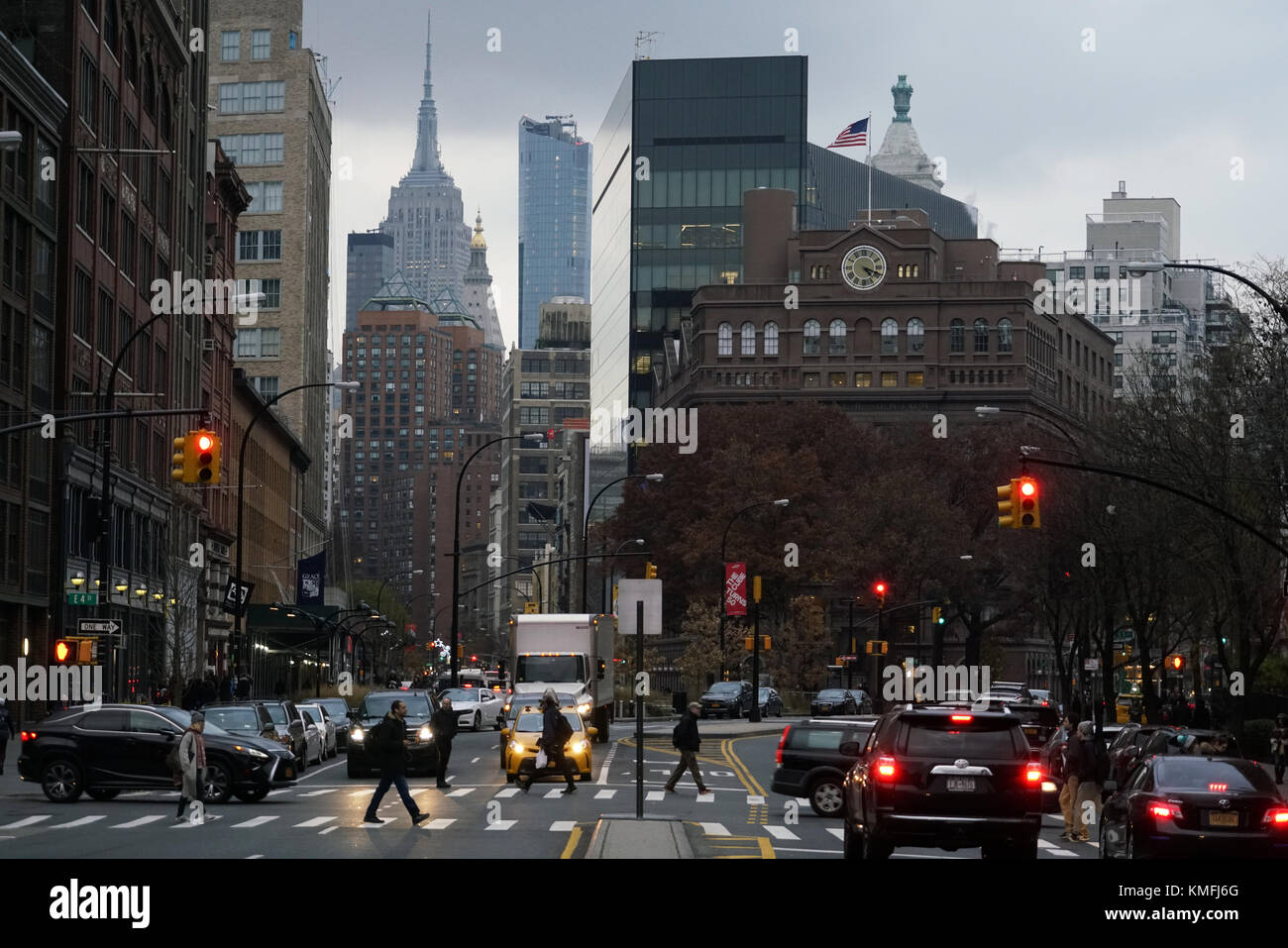Bowery Street with Cooper Square and skyline of midtown Manhattan in ...