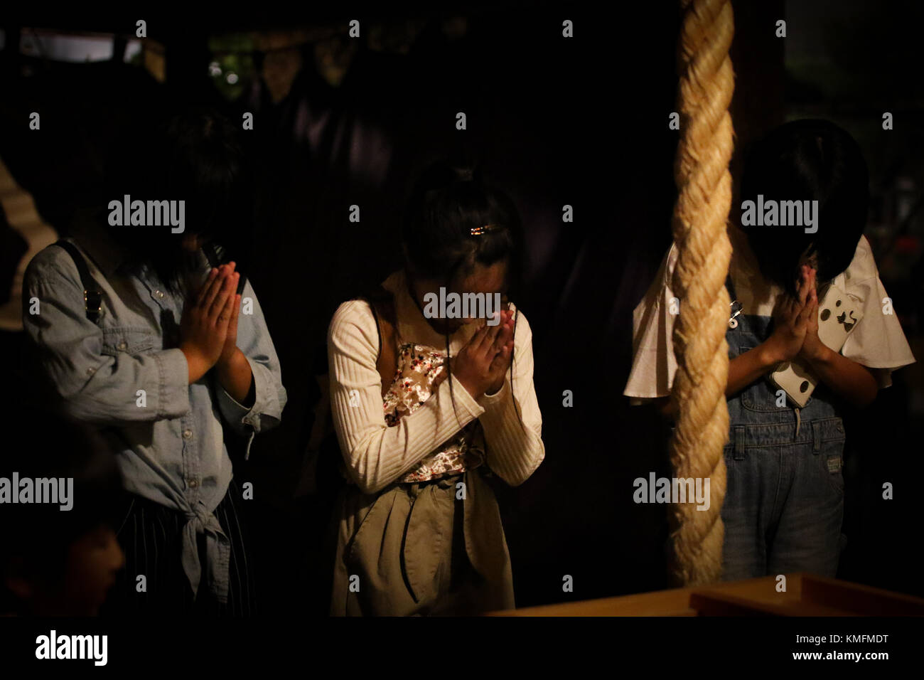Girls praying hi-res stock photography and images - Alamy