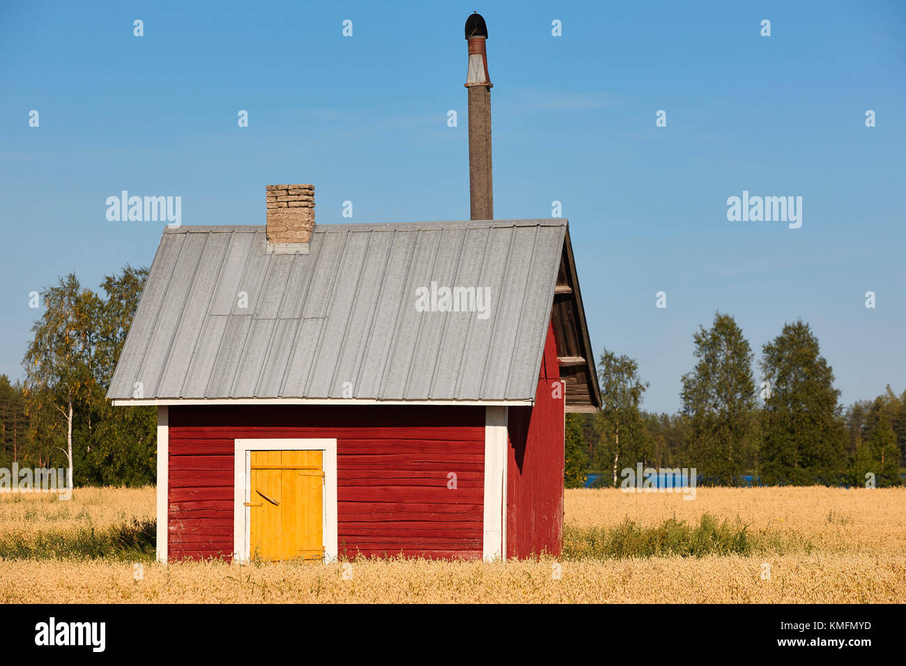 Traditional finnish red wooden farm in the countryside. Finland Stock ...