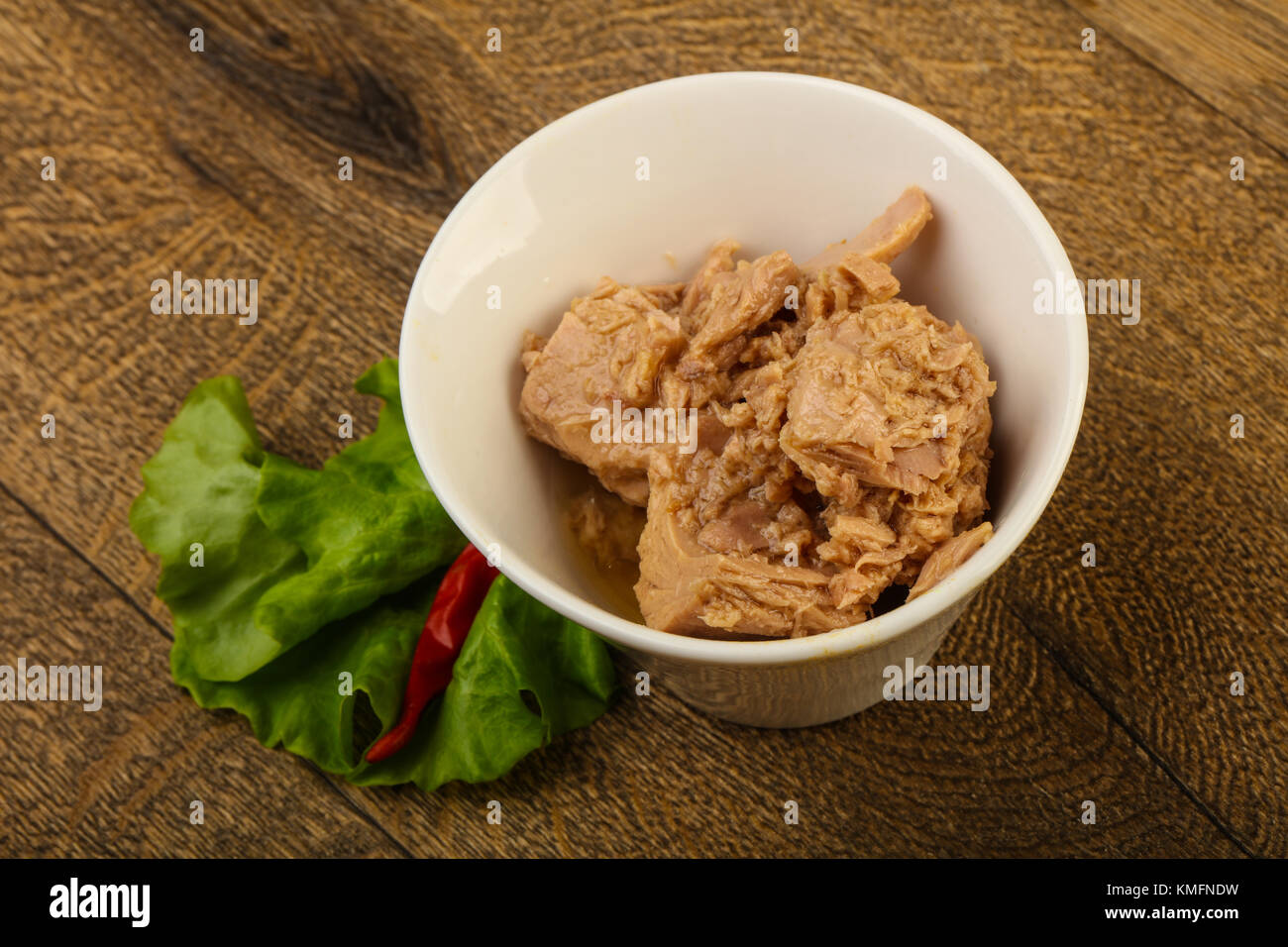 Canned tuna fish in the bowl ready for cooking Stock Photo - Alamy