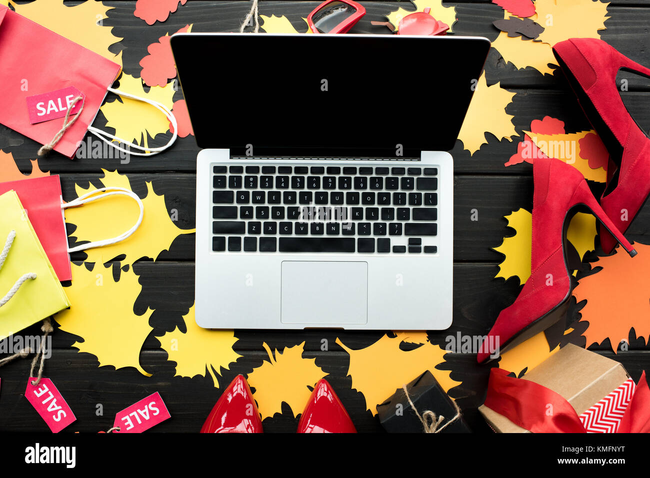laptop on paper foliage Stock Photo - Alamy