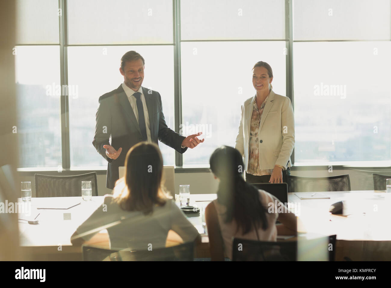 Businessman talking in conference room meeting Stock Photo - Alamy