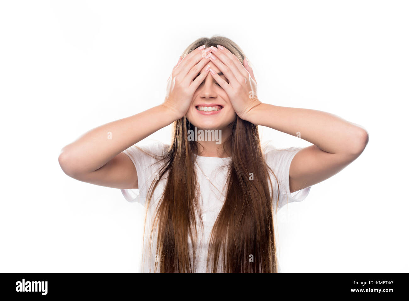 girl covering eyes with hands Stock Photo - Alamy