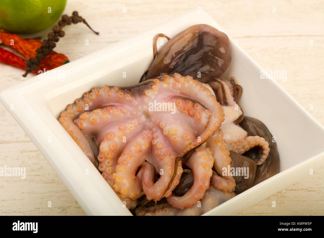 Raw octopus ready for cooking Stock Photo - Alamy