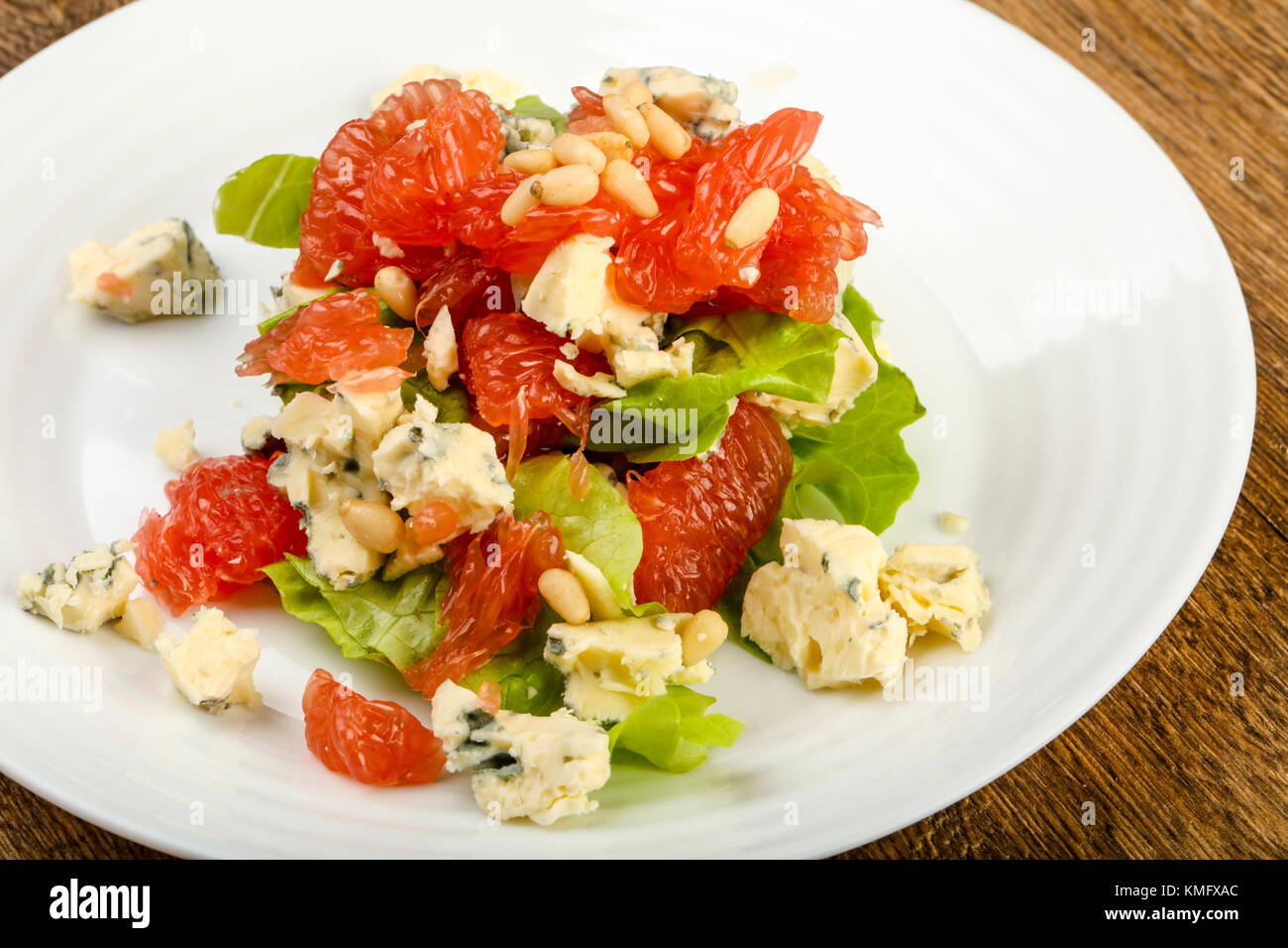 Grapefruit and blue cheese salad with cedar nut Stock Photo - Alamy