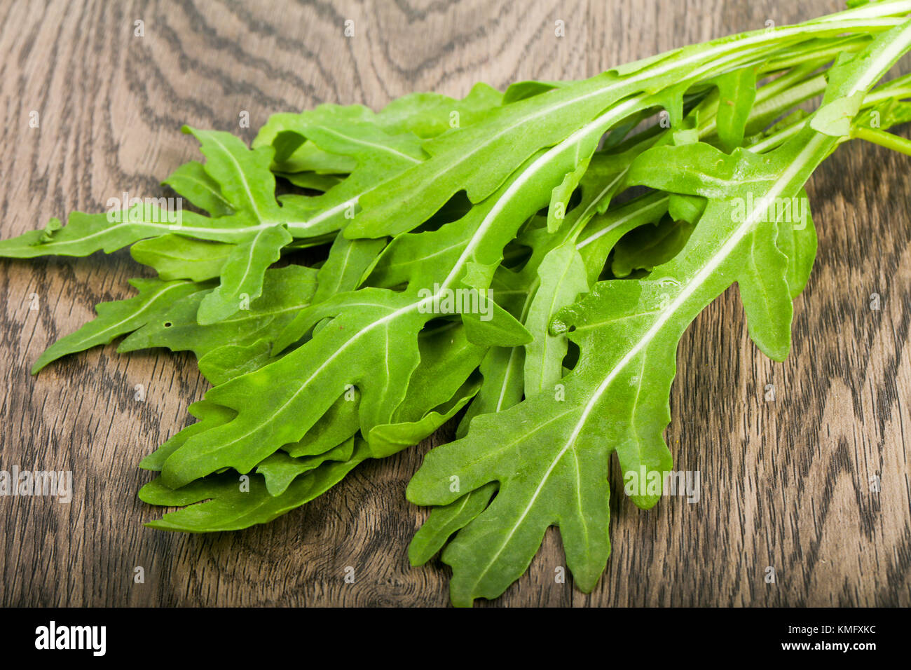 Green fresh Rucola leaves Stock Photo - Alamy
