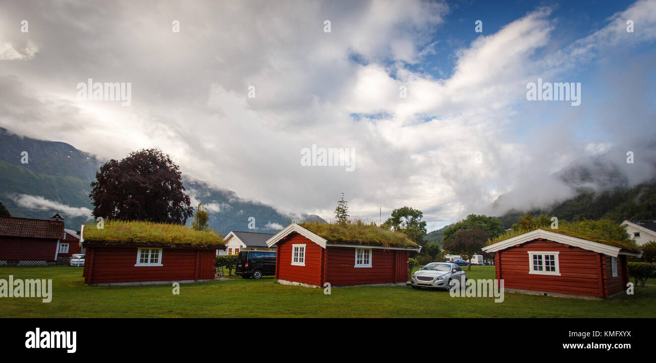 Camping houses in Norway with cloud and mountains Stock Photo - Alamy