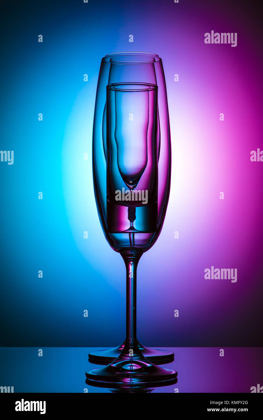 Champagne glass on color background n studio Stock Photo - Alamy