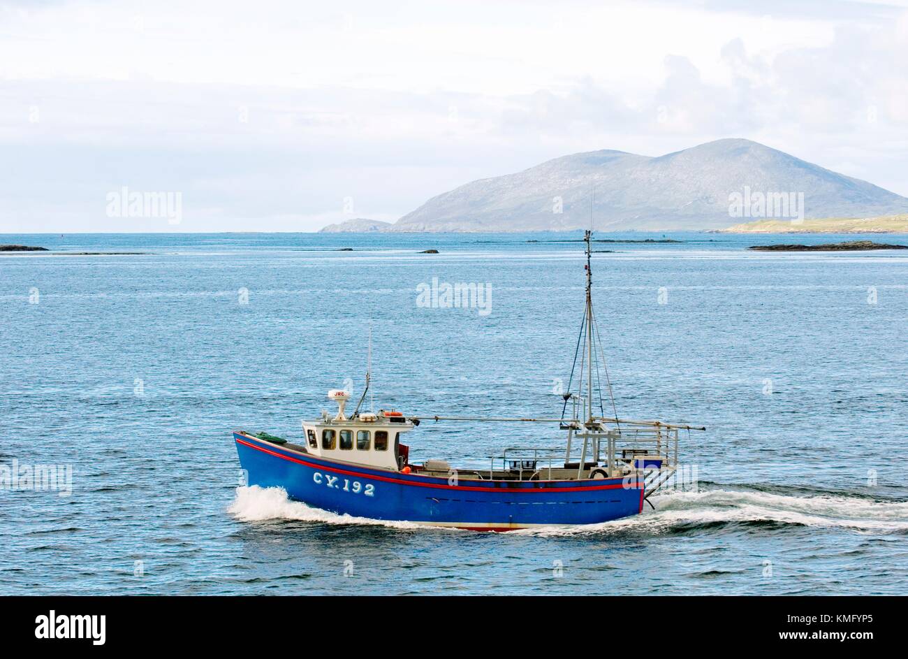 Fishing boat in the Sound of Harris, Western Isles, Scotland. Looking ...