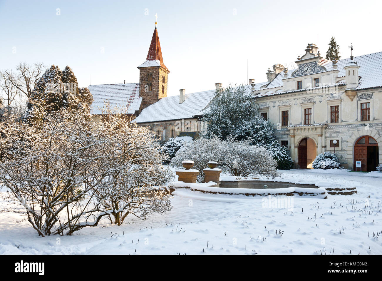 renaissance Pruhonice castle with gardens in the winter with snow at ...