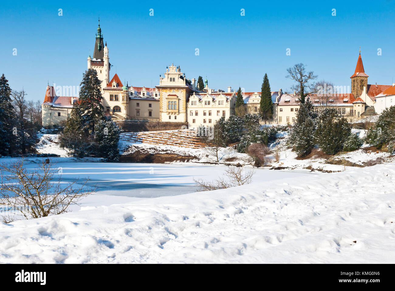 renaissance Pruhonice castle with gardens in the winter with snow at ...