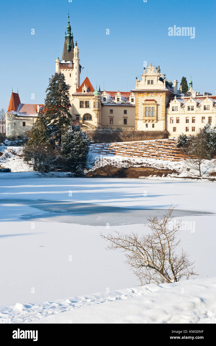 renaissance Pruhonice castle with gardens in the winter with snow at ...