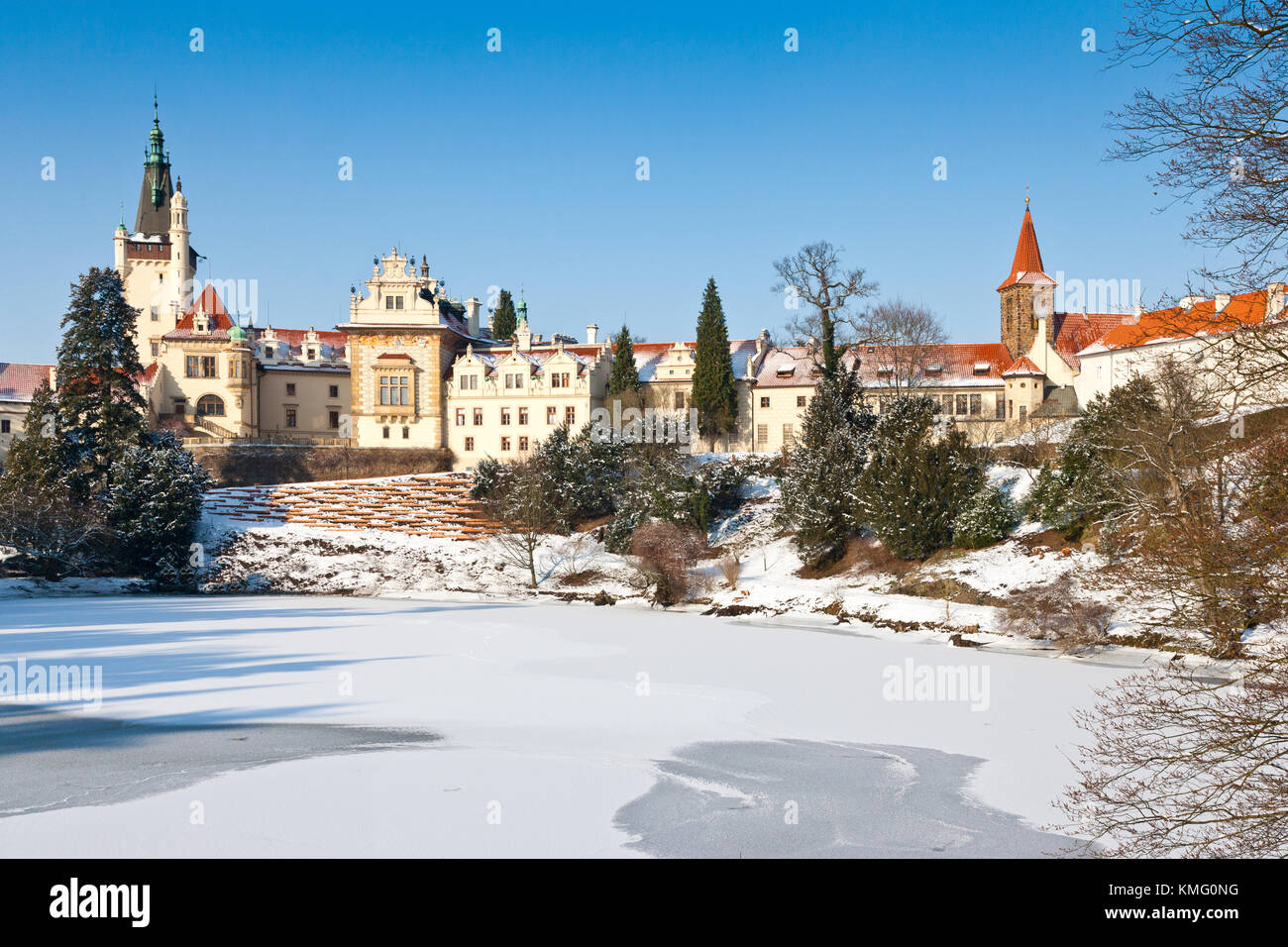 renaissance Pruhonice castle with gardens in the winter with snow at ...