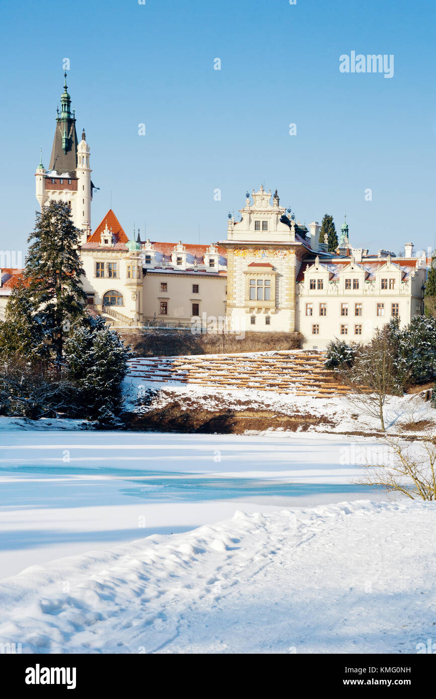 renaissance Pruhonice castle with gardens in the winter with snow at ...