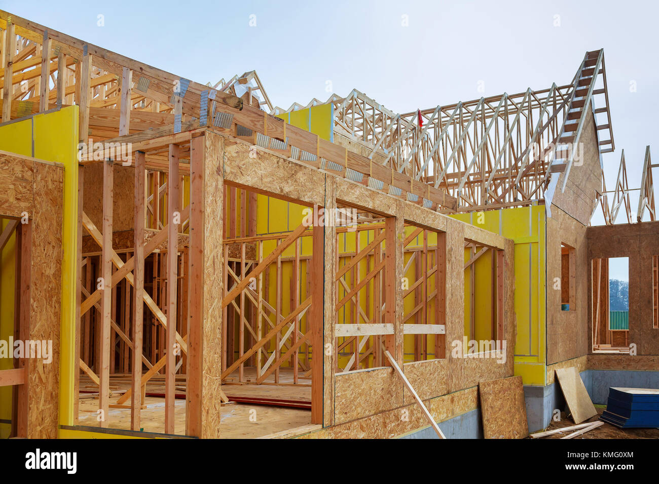 Installation of wooden beams at construction of frame house a new home ...