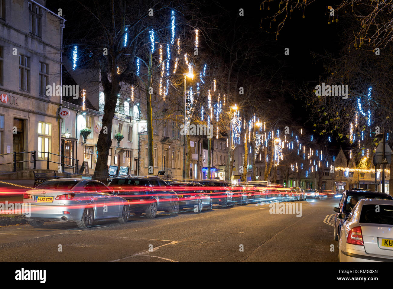 Christmas lights and decorations with car light trails in Witney town ...