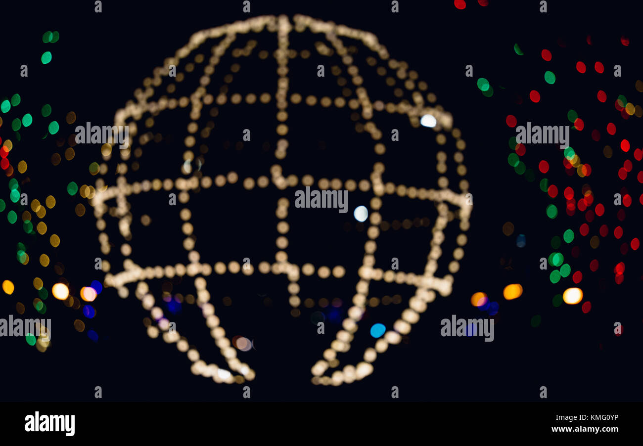Abstract illuminated christmas sphere with various color background ...