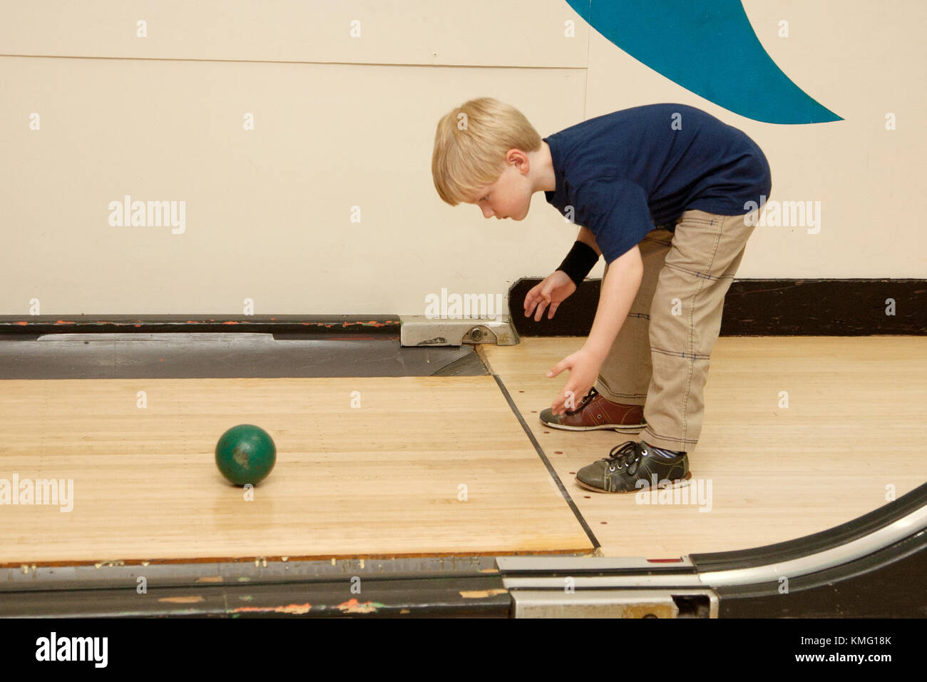 Boy bowling alley hi-res stock photography and images - Alamy