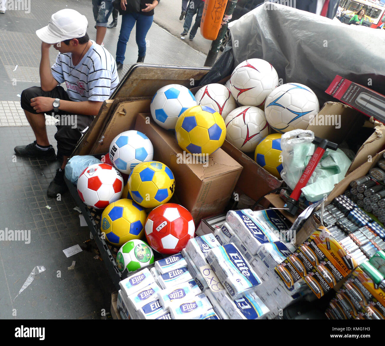 A general view of atmosphere of soccer balls for sale on street on ...