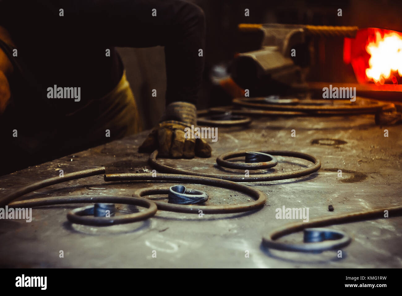 forged products are on the table in the forge workshop Stock Photo - Alamy