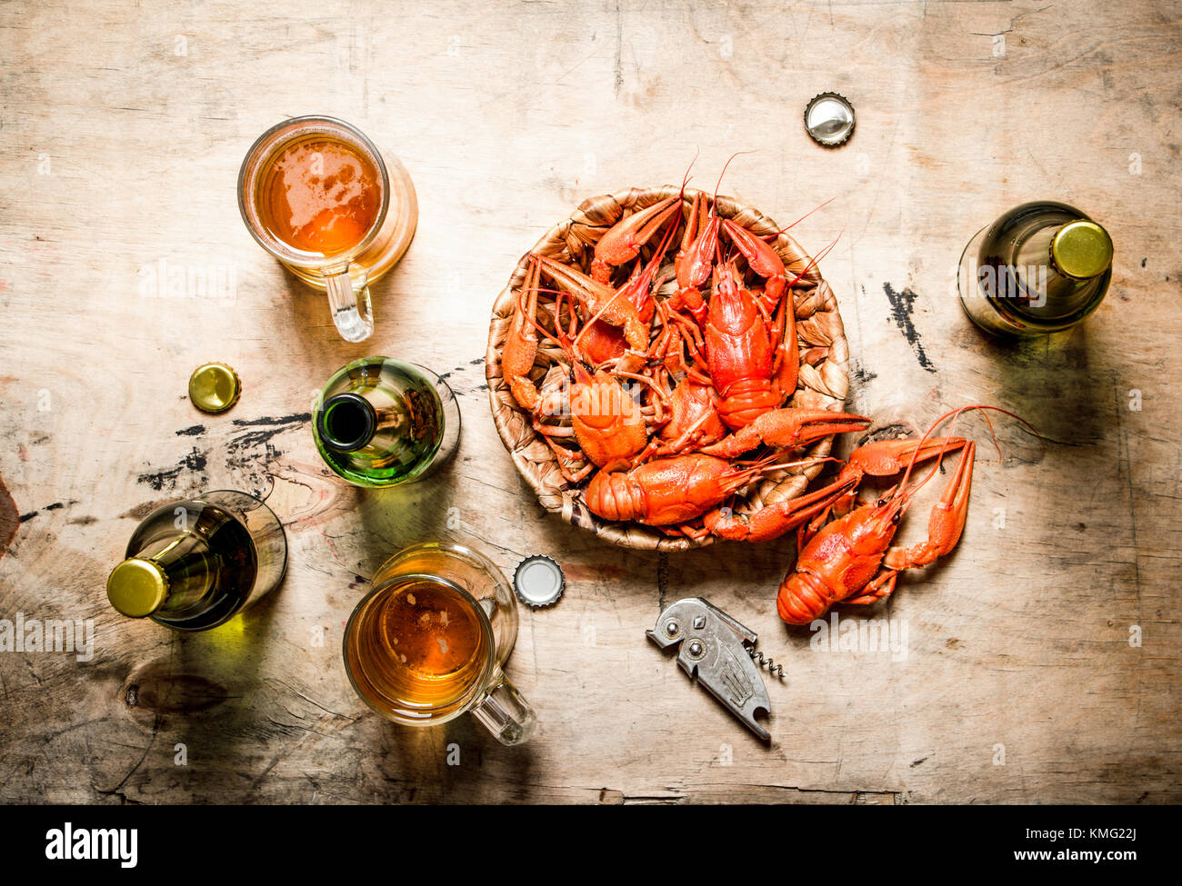 Fresh boiled crawfish with beer. On Wooden background Stock Photo - Alamy