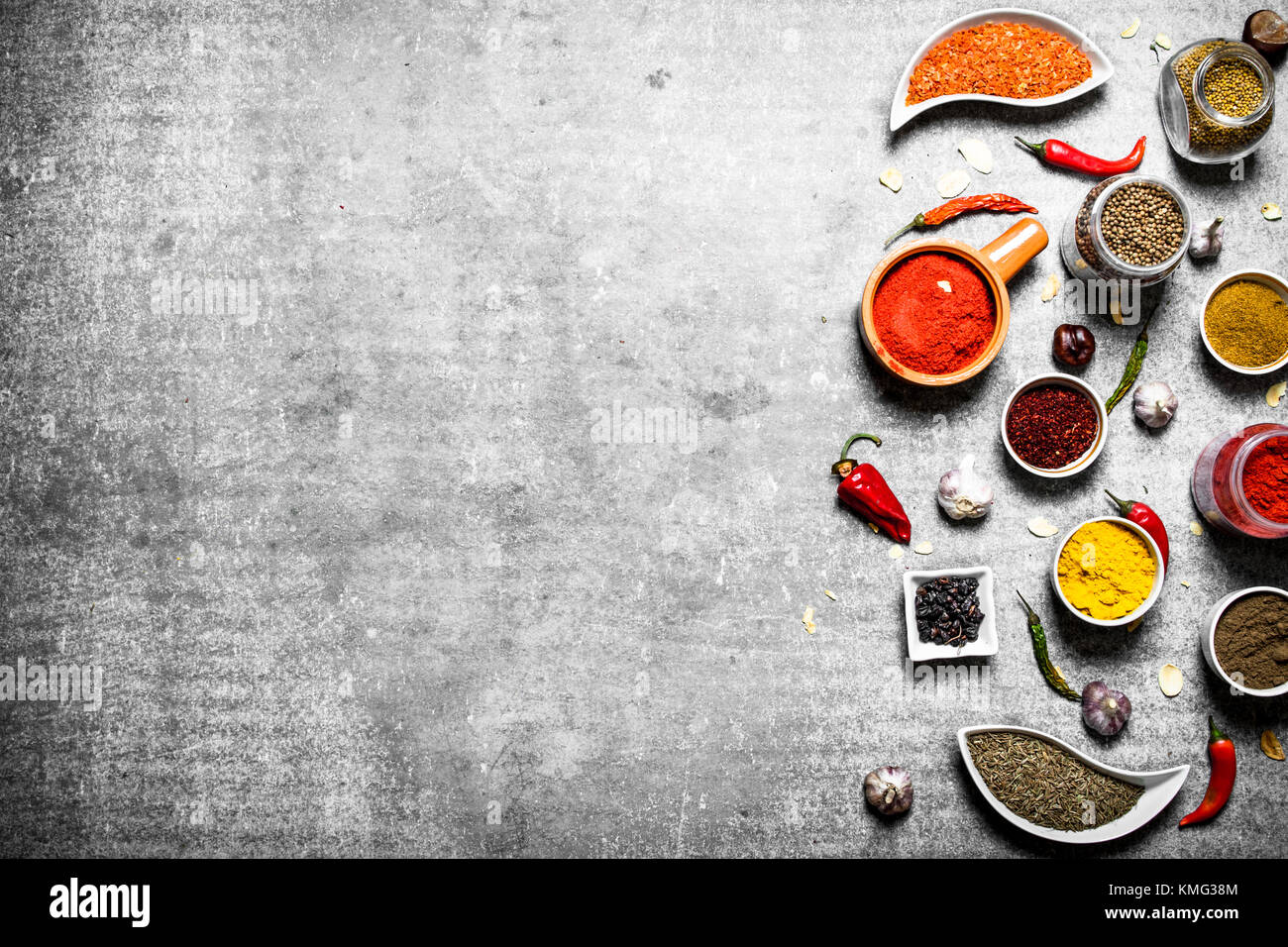 Big set of aromatic spices. On a stone background Stock Photo - Alamy