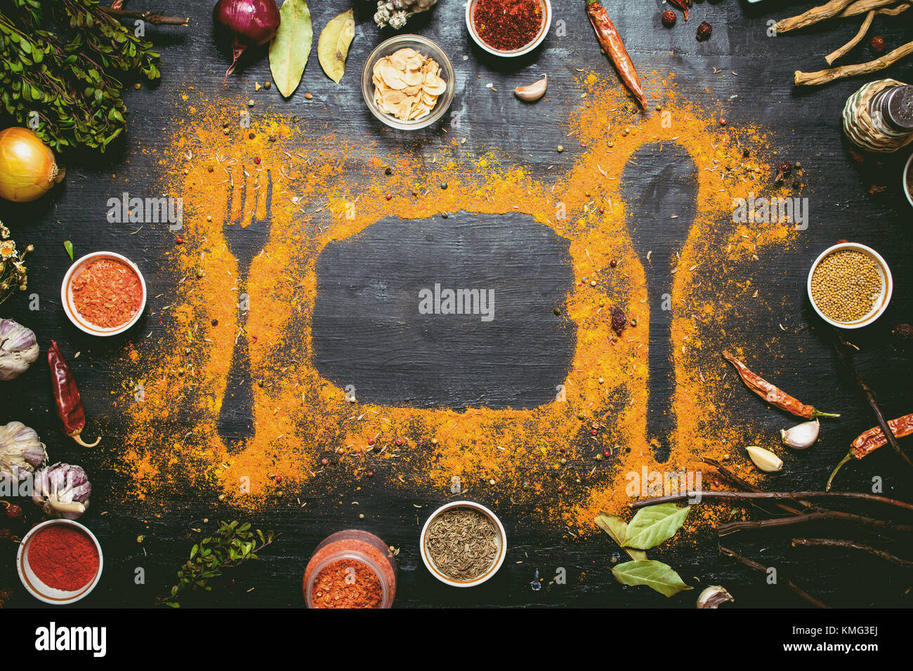 Indian spices and herbs. Print of ground spices on the table. On the ...