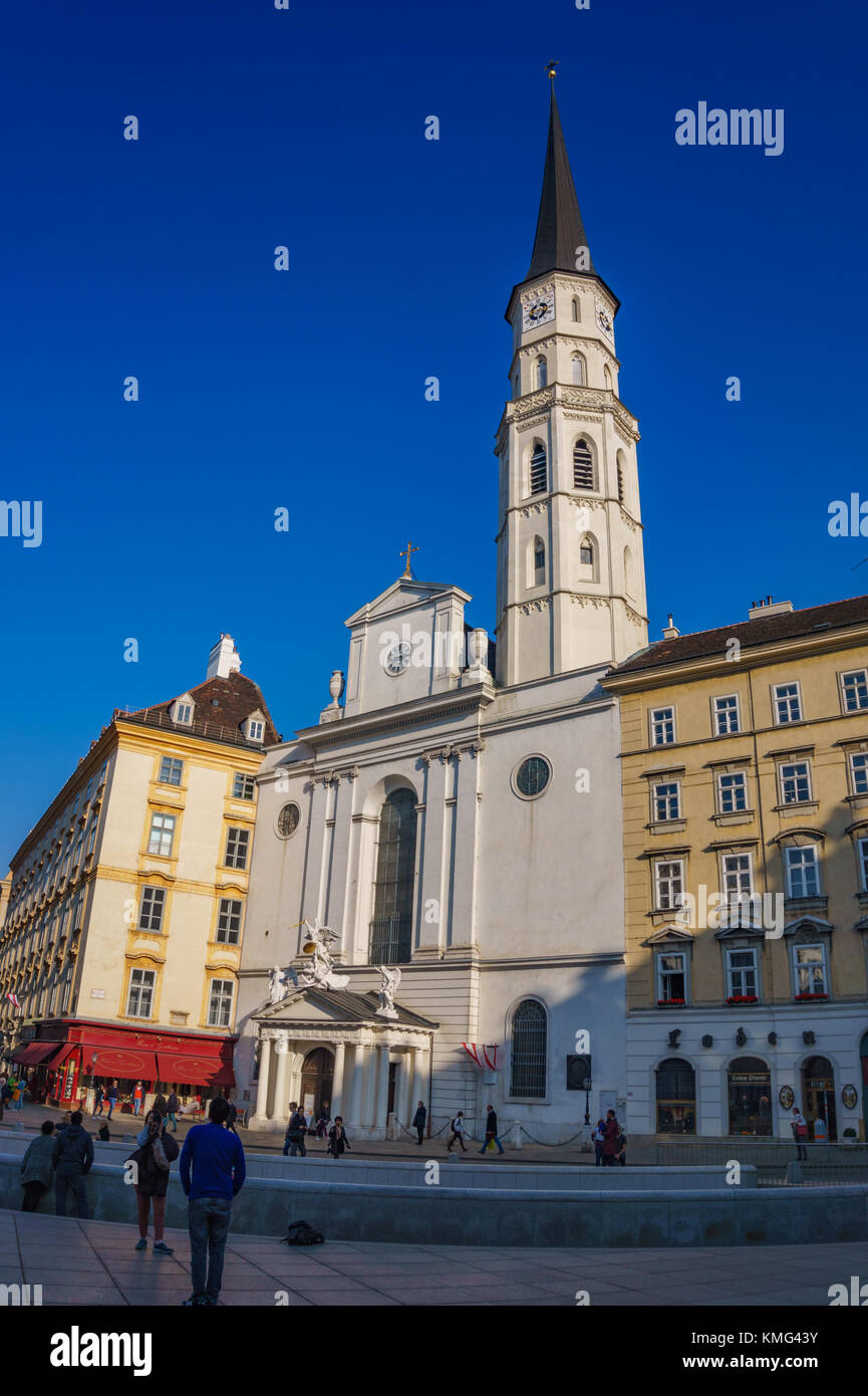 Architectural buildings and street traffic in a typical day in Vienna ...