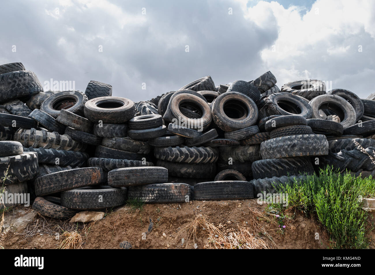 A waste heap of old tyres for rubber recycling Stock Photo - Alamy